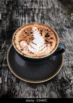 Cappuccinos with milk foam patterns (latte art Stock Photo - Alamy