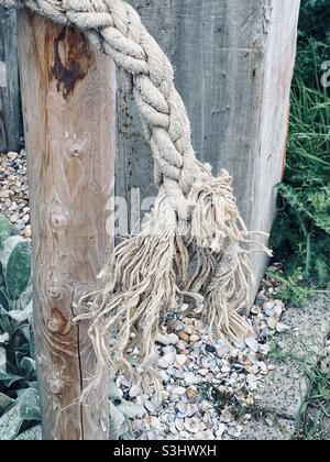 rope is wrapped around a pole outdoor Stock Photo - Alamy