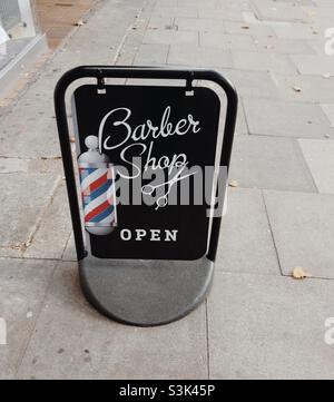 Barber open sign Stock Photo - Alamy