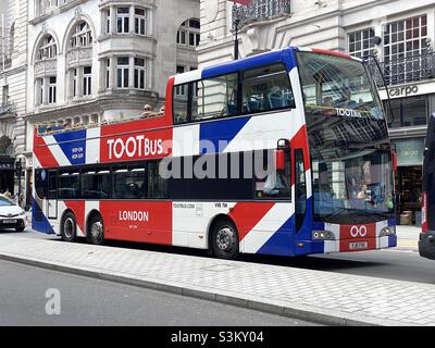 Hop on hop off, Toot bus, tourist bus on the road in Paris France Stock ...