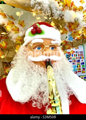Trumpet Playing Santa Stock Photo - Alamy