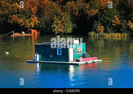 Floating summer cabin, autumn colours, fall, forest, lakeside ...