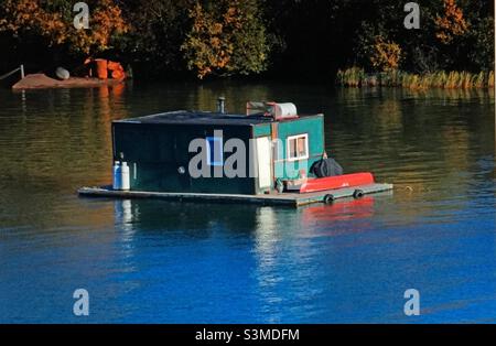 Floating summer cabin, autumn colours, fall, forest, lakeside ...