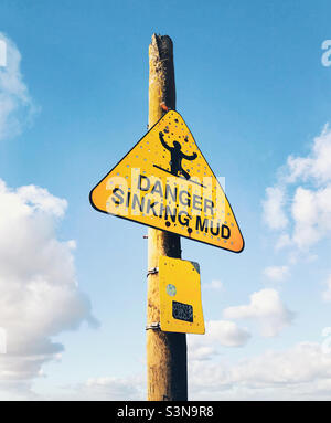 Danger Sinking Mud sign on the beach at Weston-Super- Mare, Somerset ...