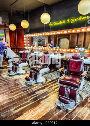 Inside a trendy barbershop in Leeds Stock Photo - Alamy
