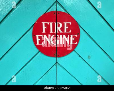 Fire Engine sign on door of fire station in the small village of ...
