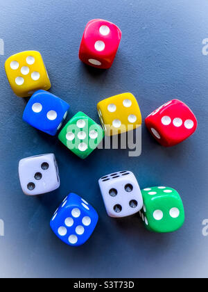 Coloured dice, coloured die Stock Photo - Alamy