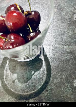 Cherry and glass Stock Photo - Alamy