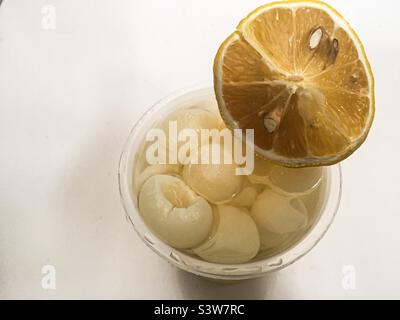 Longan fruit and lemon in packaging ready to be sold in the market ...