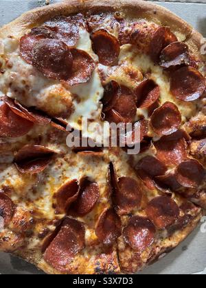 A large pepperoni pizza Stock Photo - Alamy