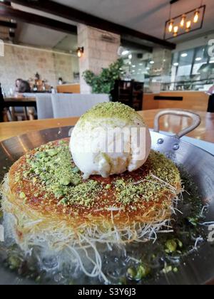 Knafe with ice cream Stock Photo - Alamy