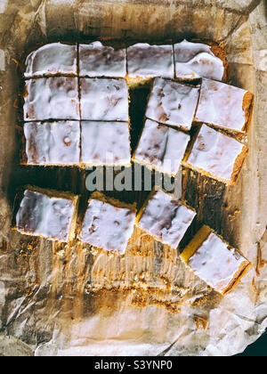 Homemade tray bake sponge with an icing topping Stock Photo - Alamy