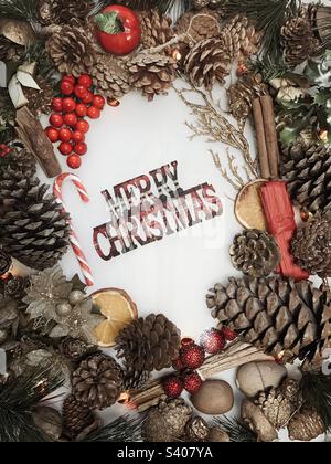 A festive display around tartan lettering that reads Merry Christmas ...