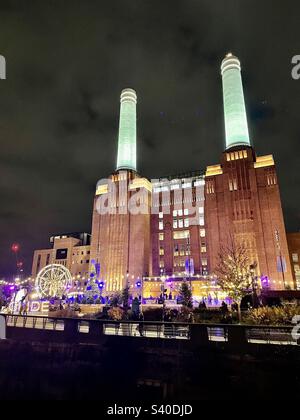 Ice Skating At Battersea Power Station at Night London UK Stock Photo ...