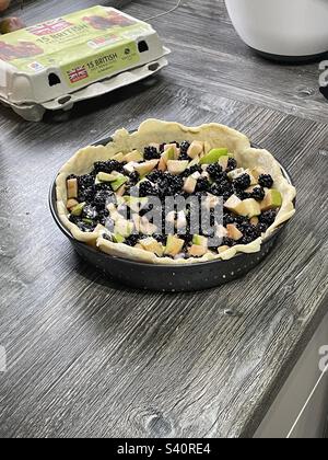Apple and Blackberry pie homemade with pastry stick man figures on the ...