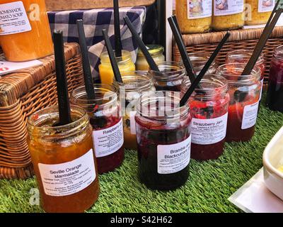 Speciality fruit jams and preserves tasting jars at local farmers ...