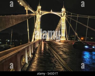 THE ALBERT BRIDGE - Chelsea to Battersea crosses the river Thames. One ...