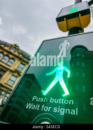 Pedestrian Puffin Crossing with traffic light on green with pedestrian ...