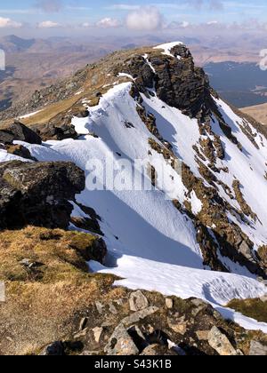 The summit of Ben Lui, with a view of Coire Gaothach holding the snow ...