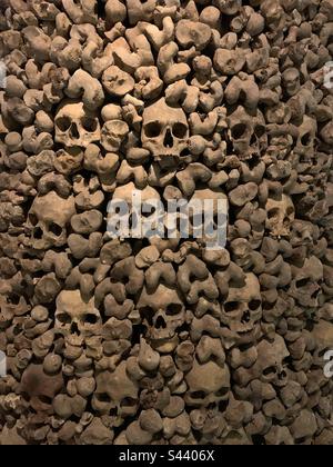 Human bones and skulls as pirate wall background Stock Photo - Alamy