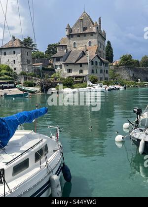 The castle and harbor of medieval Yvoire town on Lake Geneva, France ...