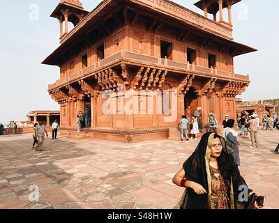 Indian women tourists at Akbar’s palace in Fatehpur Sikri in India, a ...