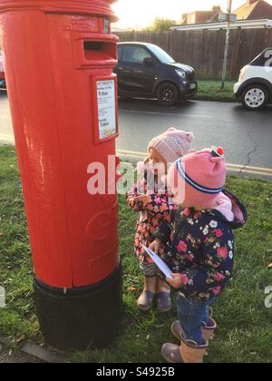A toddler posting a letter Stock Photo - Alamy