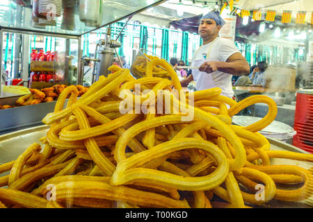 Valencia churros, cakes, sweets sold during the festival Las Fallas ...