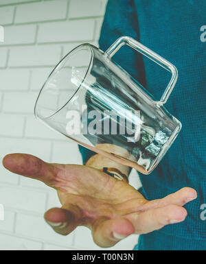 the floating glass over hand Stock Photo - Alamy