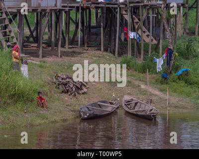 Pebas, Peru - December 04 , 2018: View of village on the bank of the ...