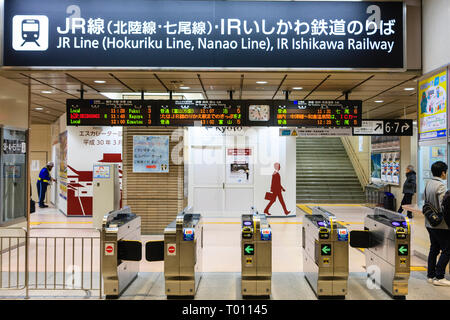 Interior of Kanazawa station, Japan. Ticket gate with barriers leading ...