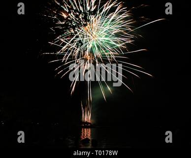 Stunning firework showers in a dark sky background Stock Photo - Alamy