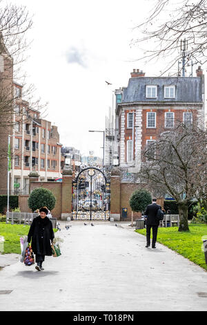 Ornamental gate entrance to Holland Park, Kensington High St ...