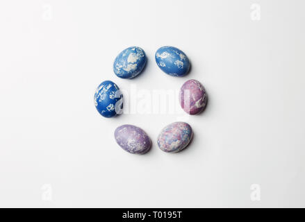 Easter wreath with colorful speckled eggs artificial red flower red ...