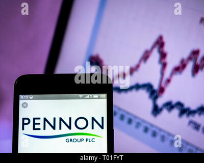 The Pennon Group logo is seen on an LED screen in the background while ...