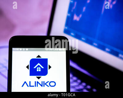 Alinco company logo seen displayed on smart phone Stock Photo - Alamy