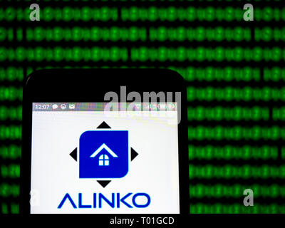 Alinco company logo seen displayed on smart phone Stock Photo - Alamy