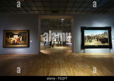 Moscow, Russia. 15th Mar, 2019. A visitor seen examining the artwork ...