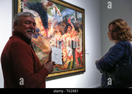 Moscow, Russia. 15th Mar, 2019. A visitor seen examining the artwork ...
