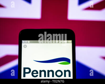 The Pennon Group logo is seen on an LED screen in the background while ...