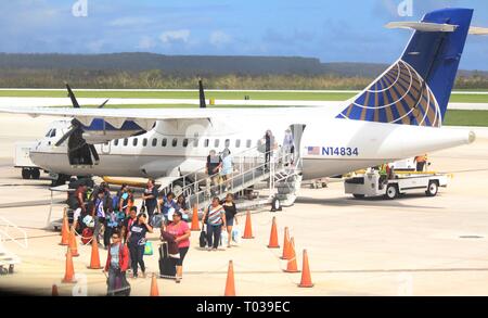 GUAM, USA—DECEMBER 2016: A United Airlines flight lands at the Guam ...