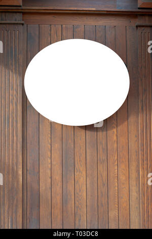 Wooden round poster frame mock up on the white wall of home studio ...