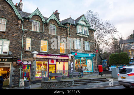 Shops stores in Ambleside town centre in summer Cumbria England UK ...