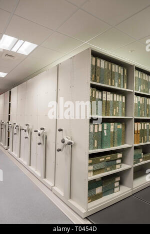 Modern mechanical library shelving storage system Stock Photo - Alamy