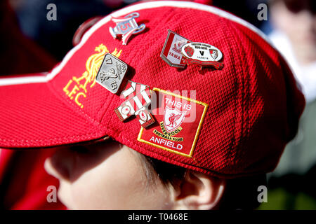 Liverpool pin badges ahead of the Premier League match at Anfield ...