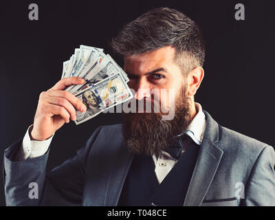 Wealthy and confident. Bearded man with dollar banknotes. Successful ...