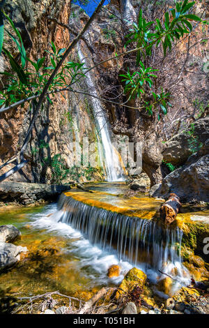 Waterfall in the gorge of Milonas near famous beach of Agia Fotia ...