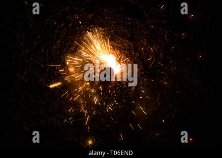 Firecrackers spinning illuminating the night with their sparks Stock ...