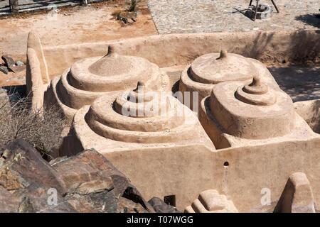 The emirate of Fujairah oldest mosque in the UAE at Badiyah with hill ...