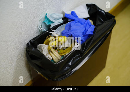 Different organic waste with gloves on green background. Compost ...
